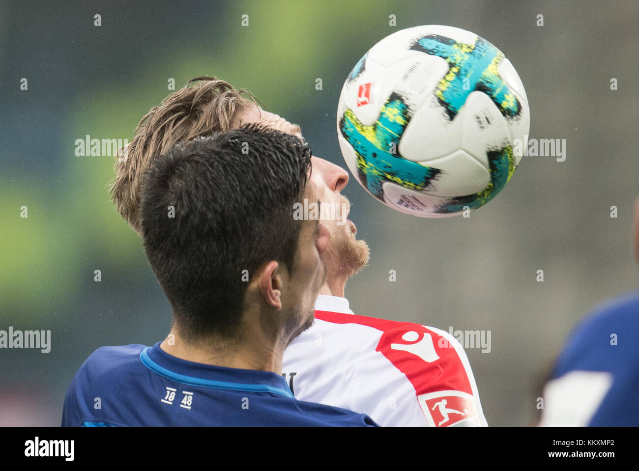 Berlin's Sebastian Polter (R) taking possession of the ball in front of ...