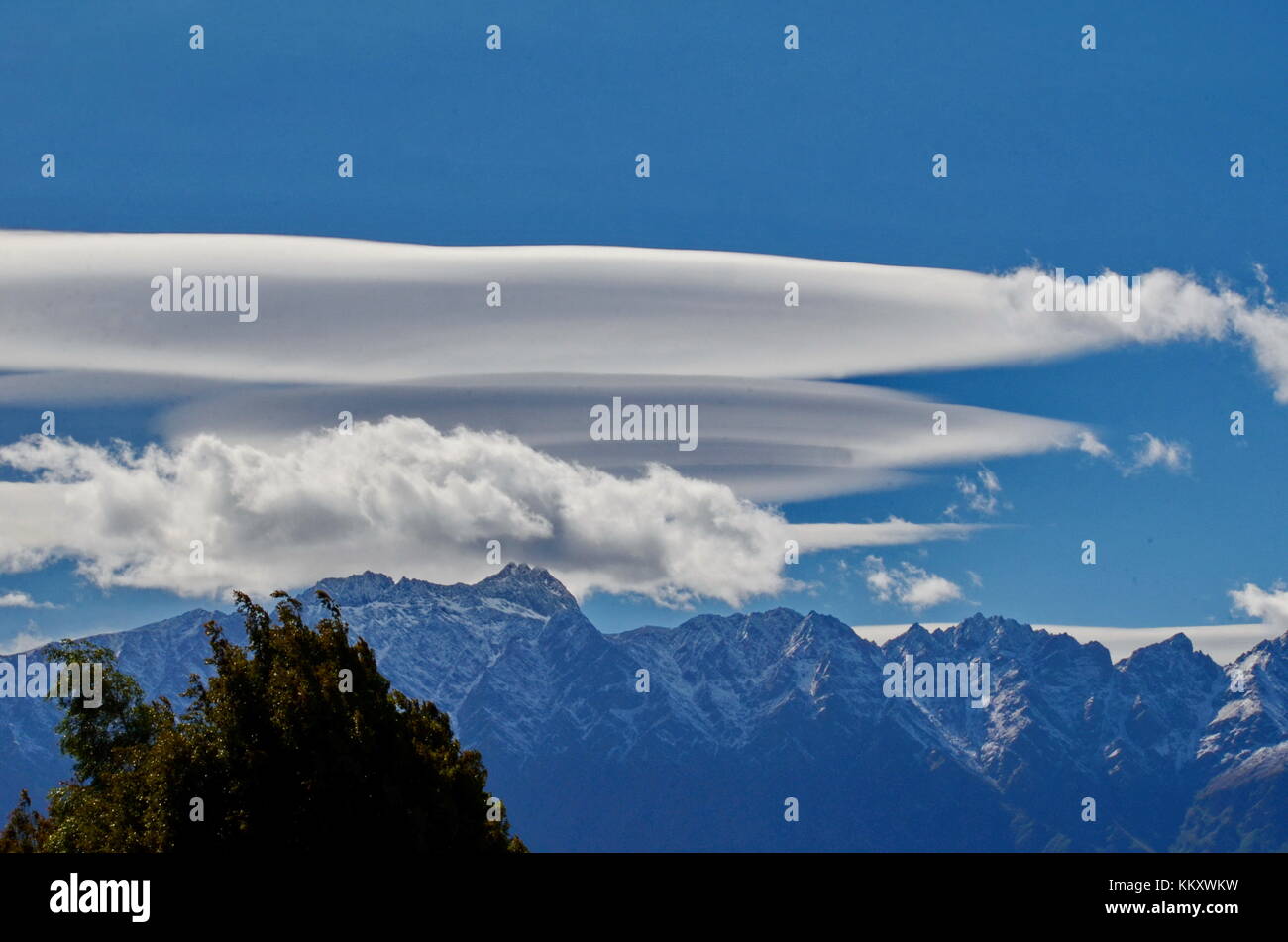 Lenticular clouds over the mountains at Queenstown, New Zealand Stock ...