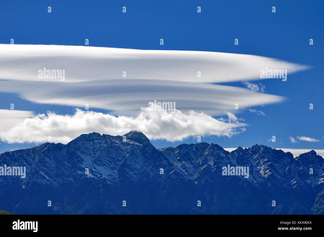 Lenticular clouds over the mountains at Queenstown, New Zealand Stock ...