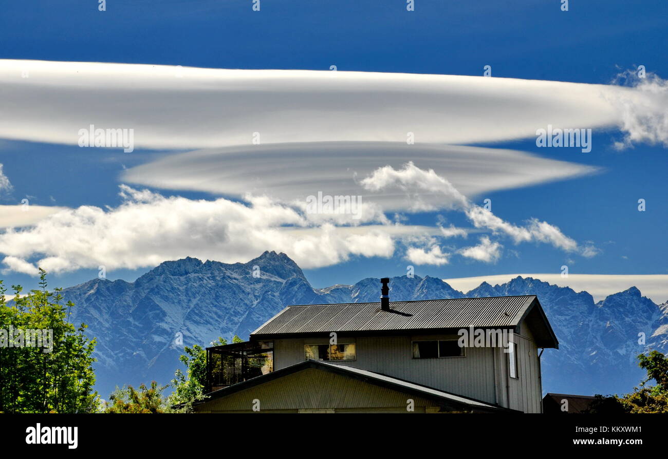Lenticular clouds over the mountains at Queenstown, New Zealand Stock ...
