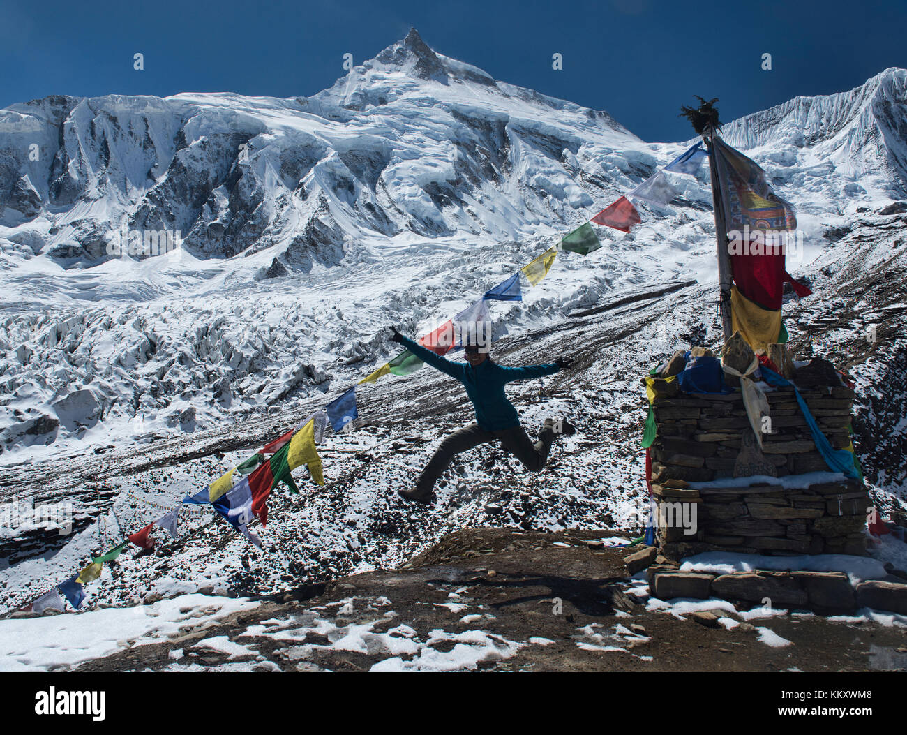 Jumping for joy at Manaslu Basecamp on the Manaslu Circuit Trail, Nepal ...