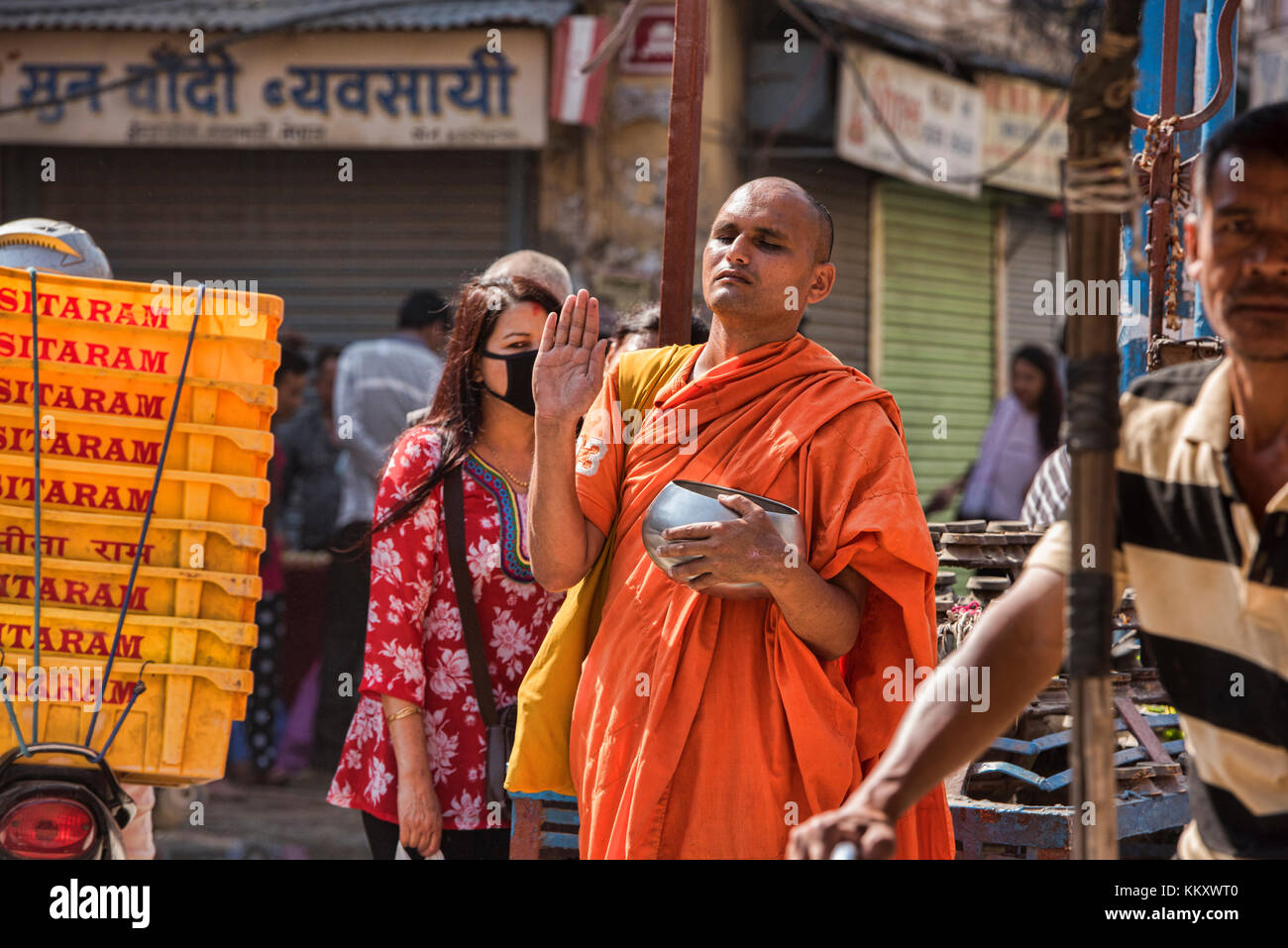 A monk meditates in the middle of chaos, Kathmandu, Nepal Stock Photo ...
