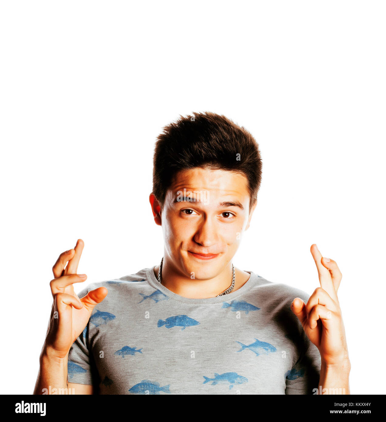 Excited fingers crossed face hi-res stock photography and images - Alamy