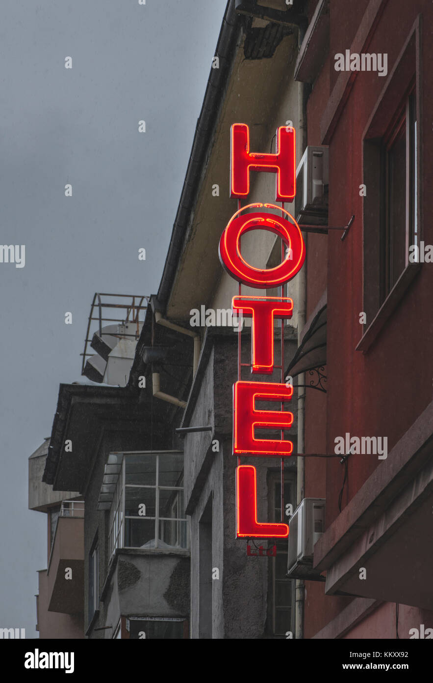 Small cheap hotel. Text Hotel on facade. Hotel in the city Stock Photo ...