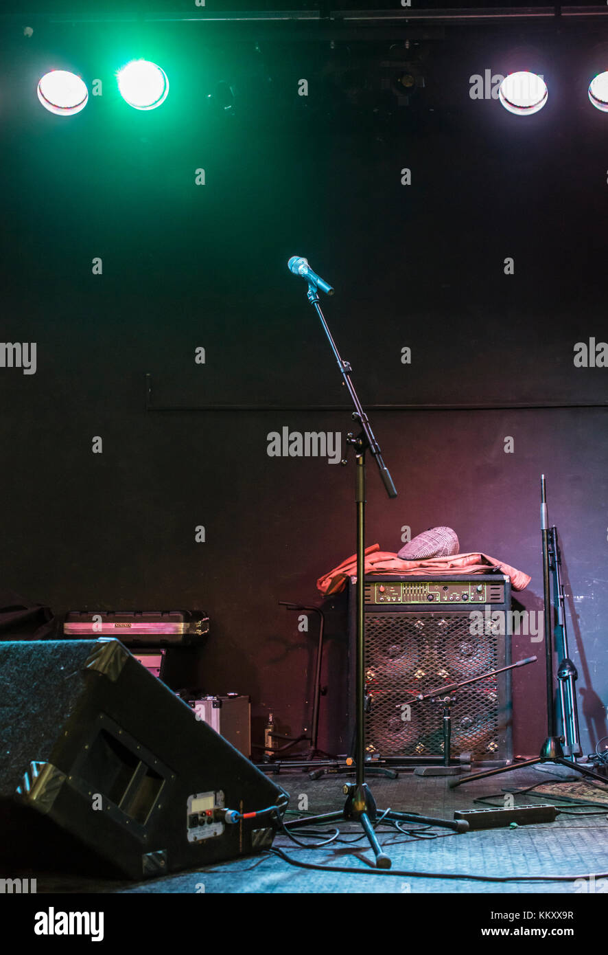 Microphone on stage and stage lights Stock Photo - Alamy