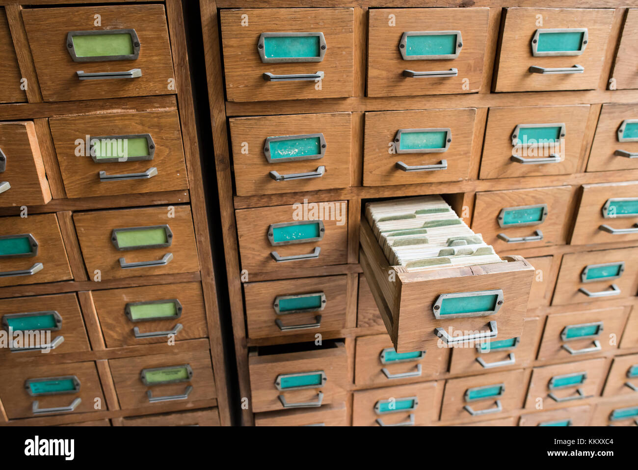Drawers in archive. Wooden shelves Stock Photo - Alamy