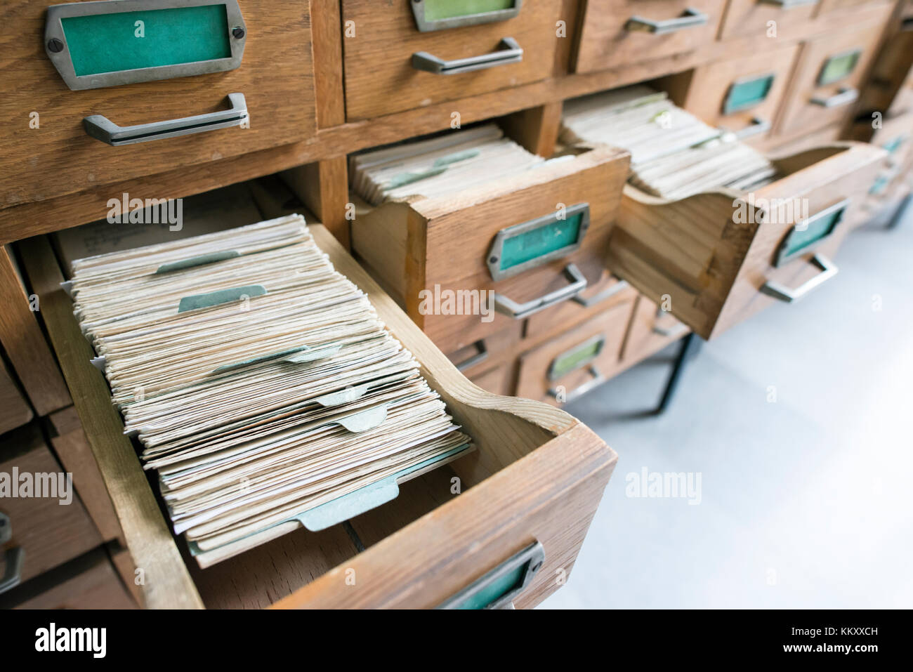 Old opened wooden drawers in archive Stock Photo - Alamy