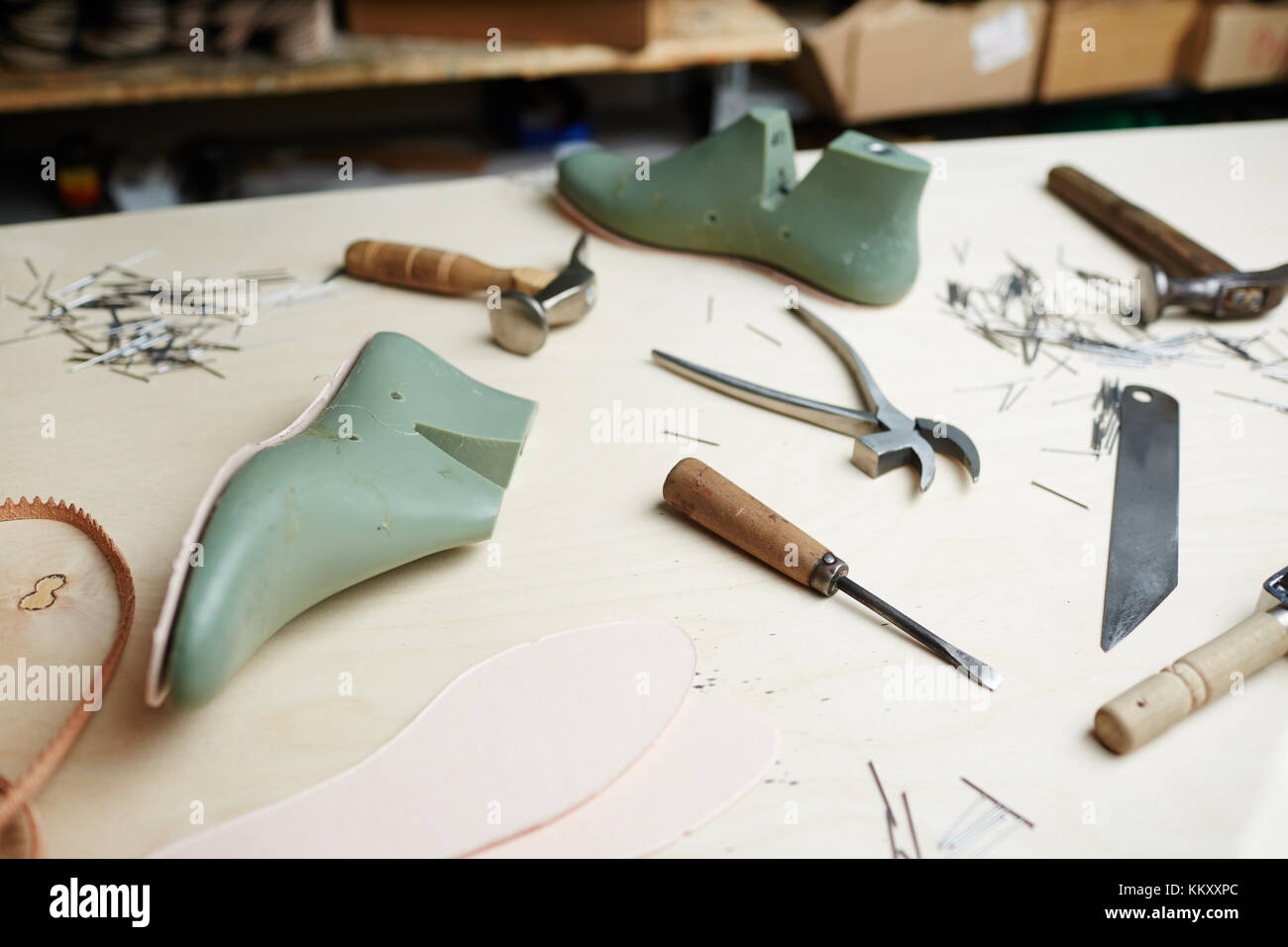 Shoe workpieces and handtools of cobbler on table of shoemaker Stock ...