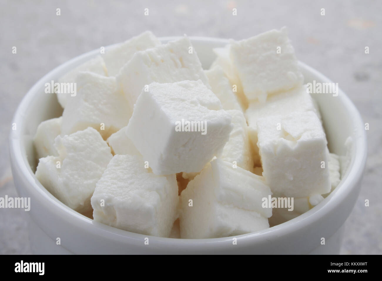 feta goats cheese cubes in dish Stock Photo - Alamy