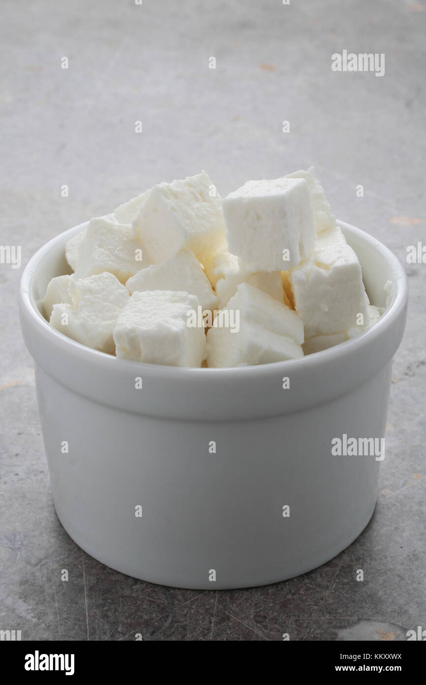 feta goats cheese cubes in dish Stock Photo - Alamy