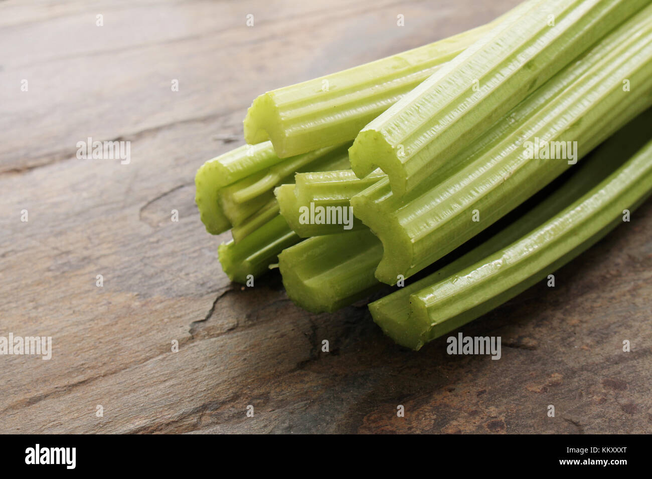 fresh cellery sticks on slate background Stock Photo - Alamy