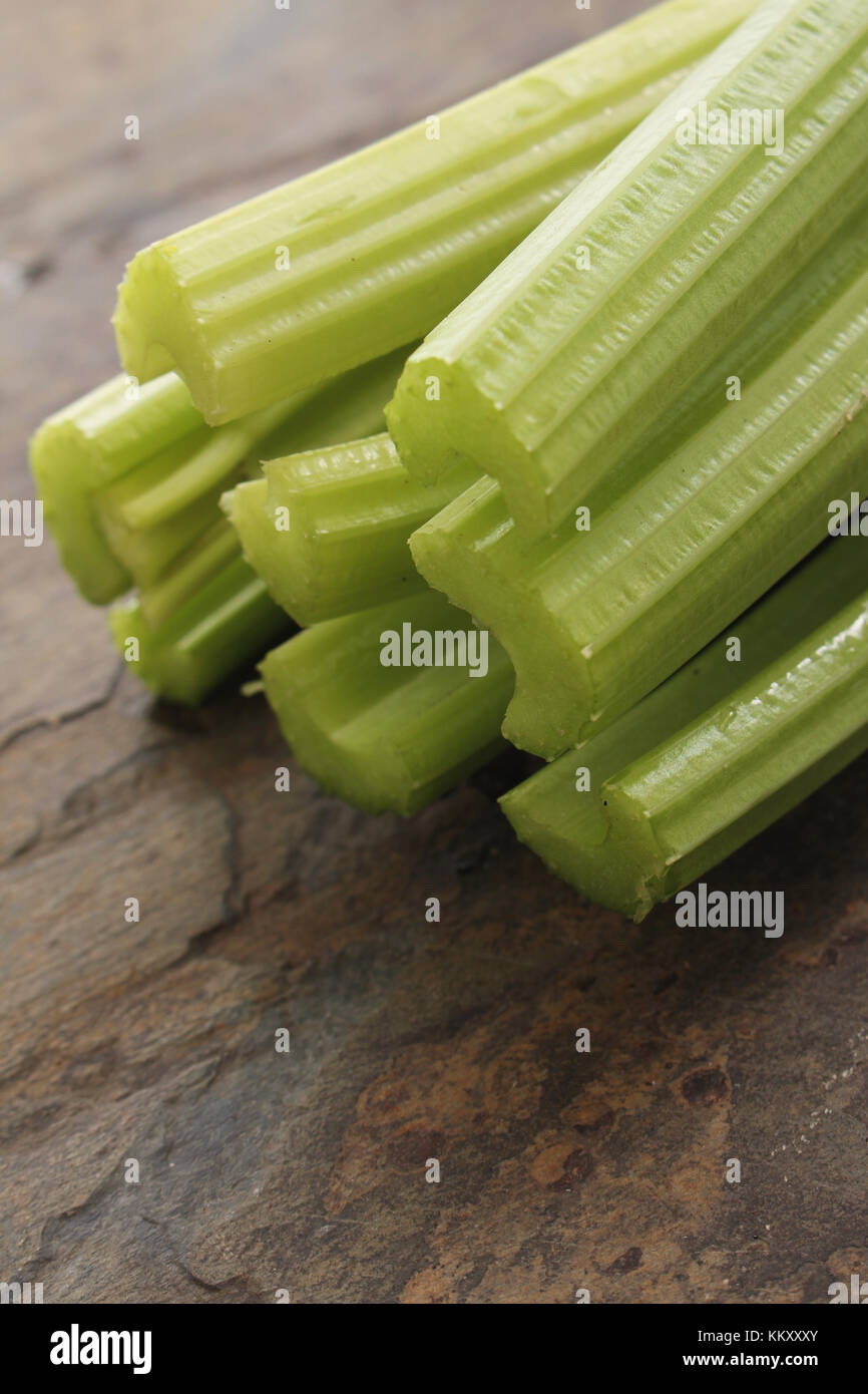 fresh cellery sticks on slate background Stock Photo - Alamy