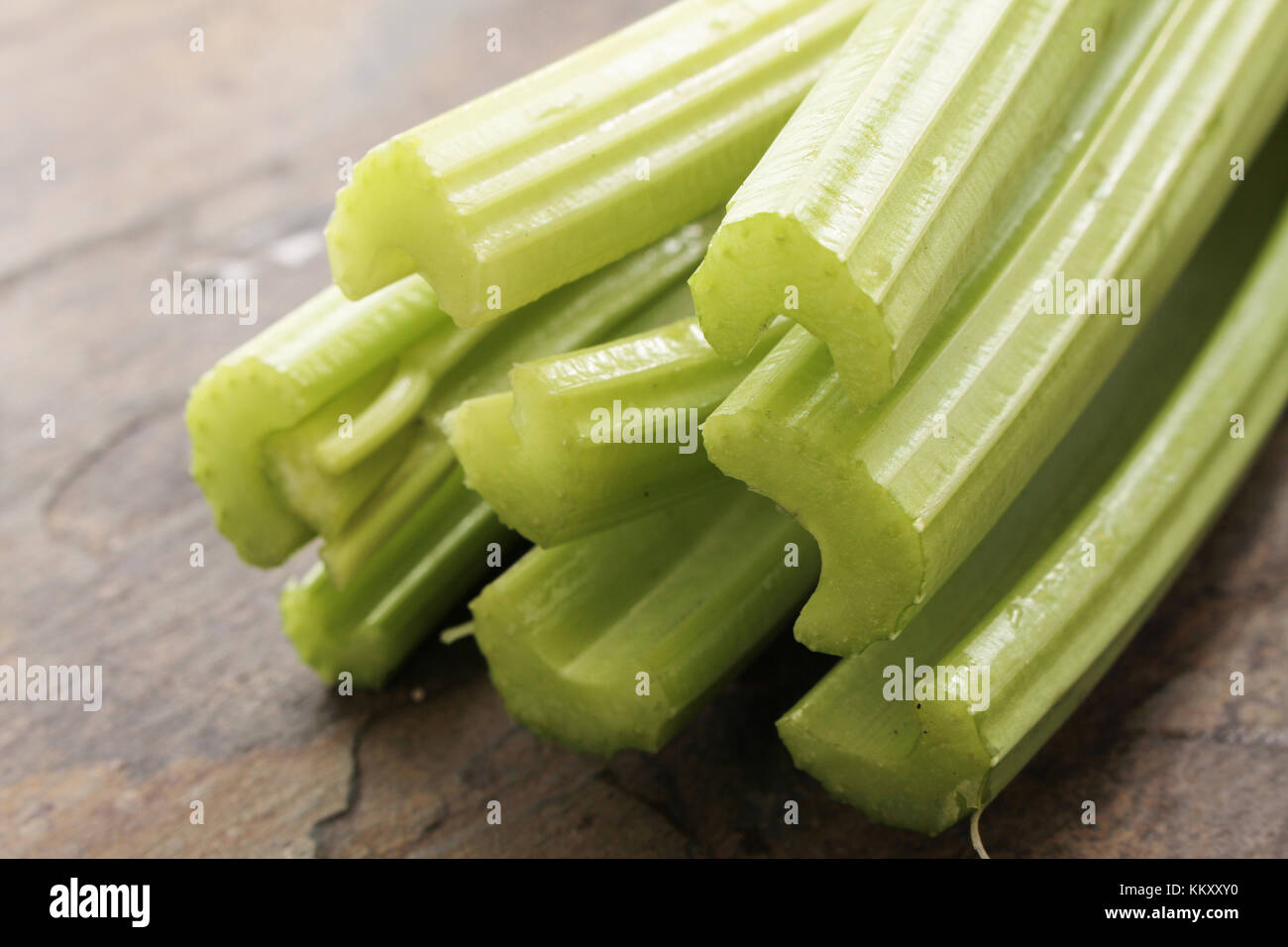 fresh cellery sticks on slate background Stock Photo - Alamy