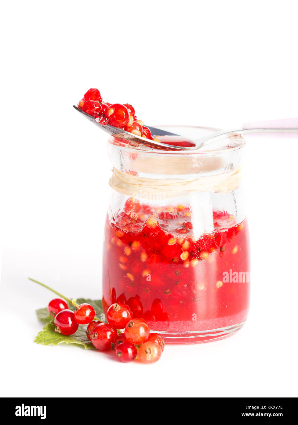 Red current homemade jam on a white background Stock Photo - Alamy