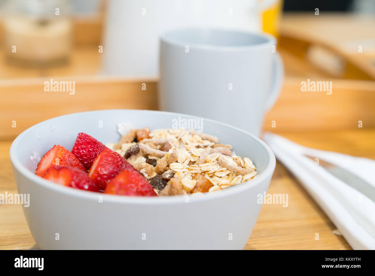Real breakfast table setting and food, crockery, and cutlery in ...