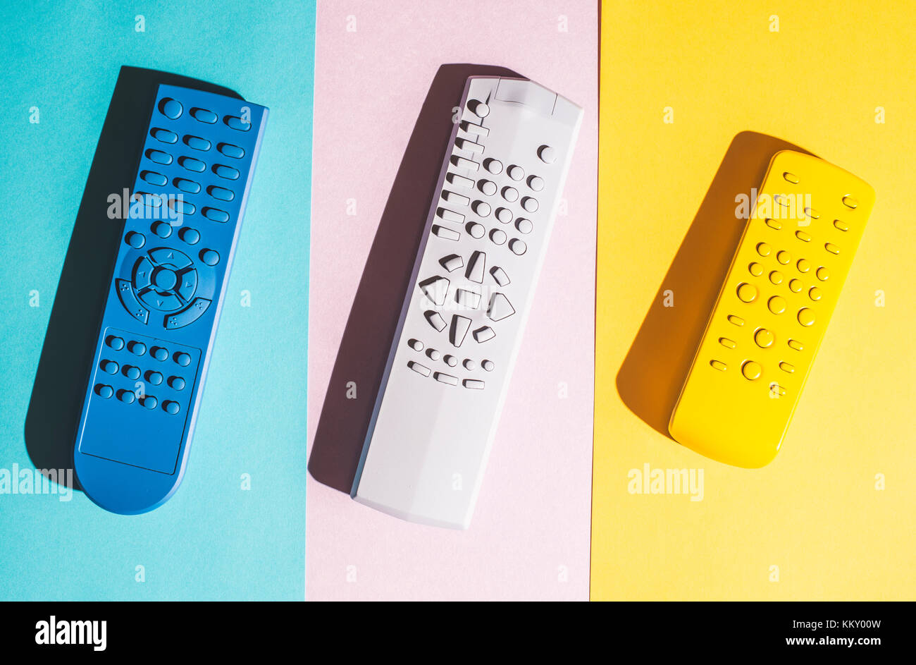 Many Colored TV remote controls on bright backgrounds Stock Photo - Alamy
