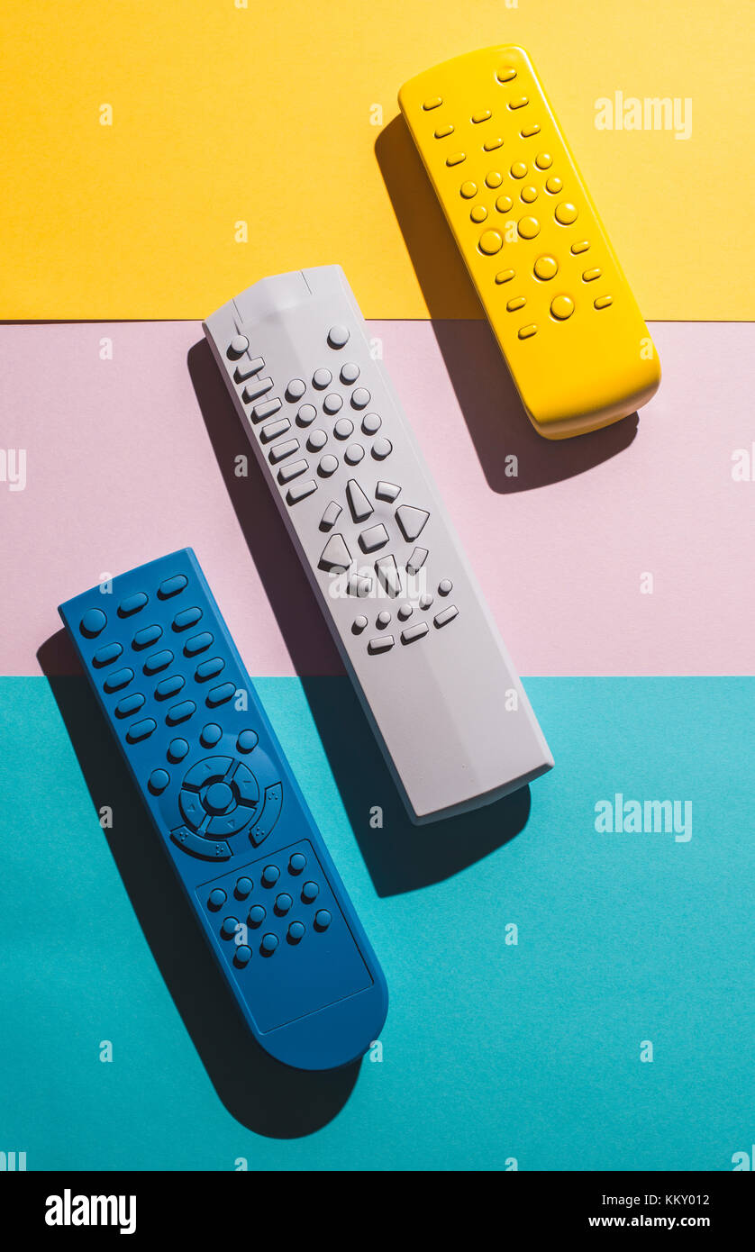 Many Colored TV remote controls on bright backgrounds Stock Photo - Alamy