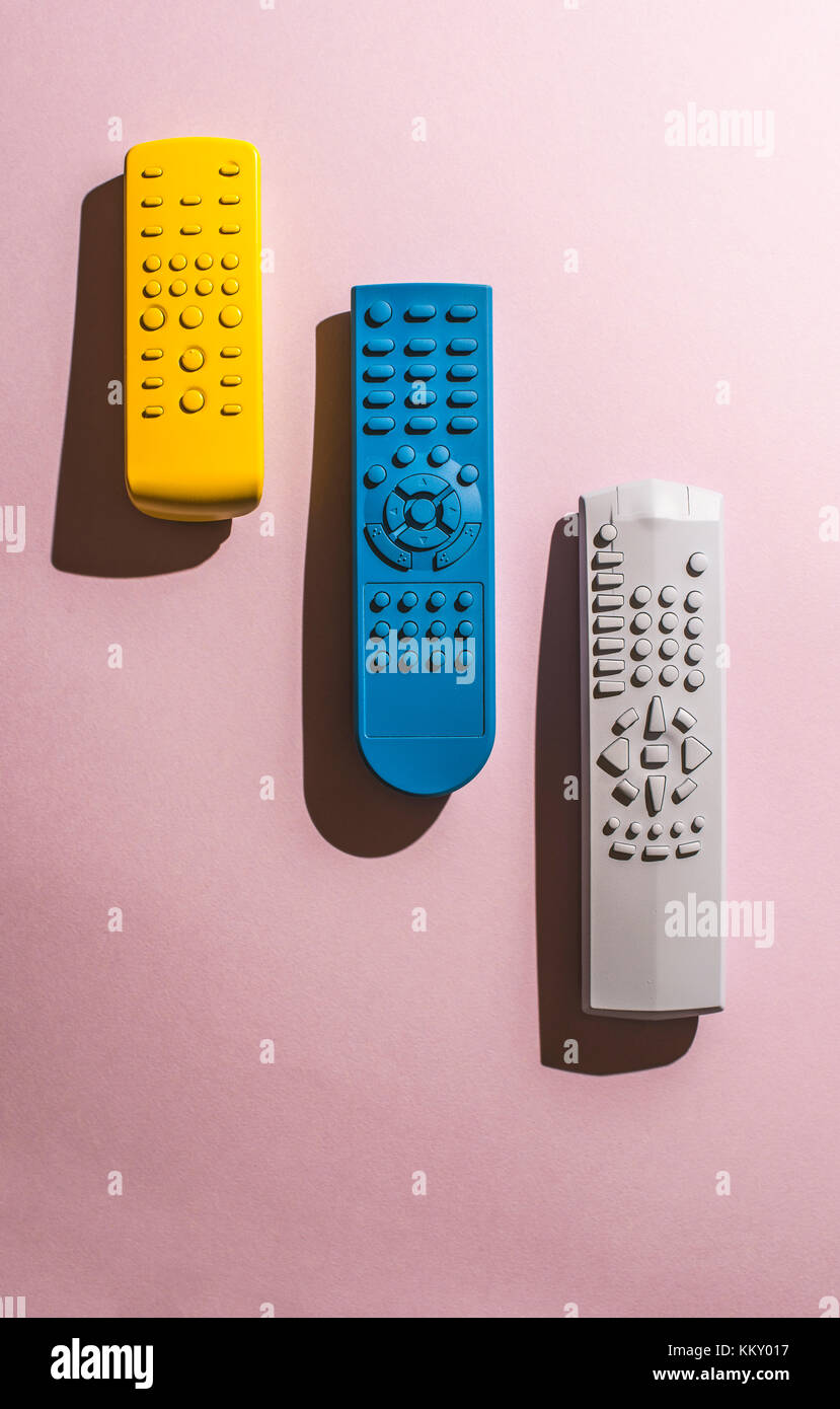 Many Colored TV remote controls on bright backgrounds Stock Photo - Alamy
