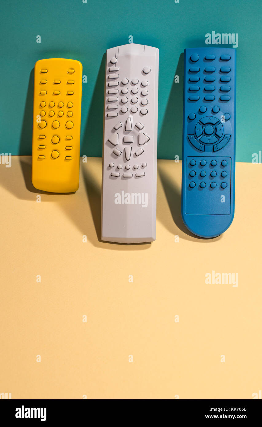 Many Colored TV remote controls on bright backgrounds Stock Photo - Alamy