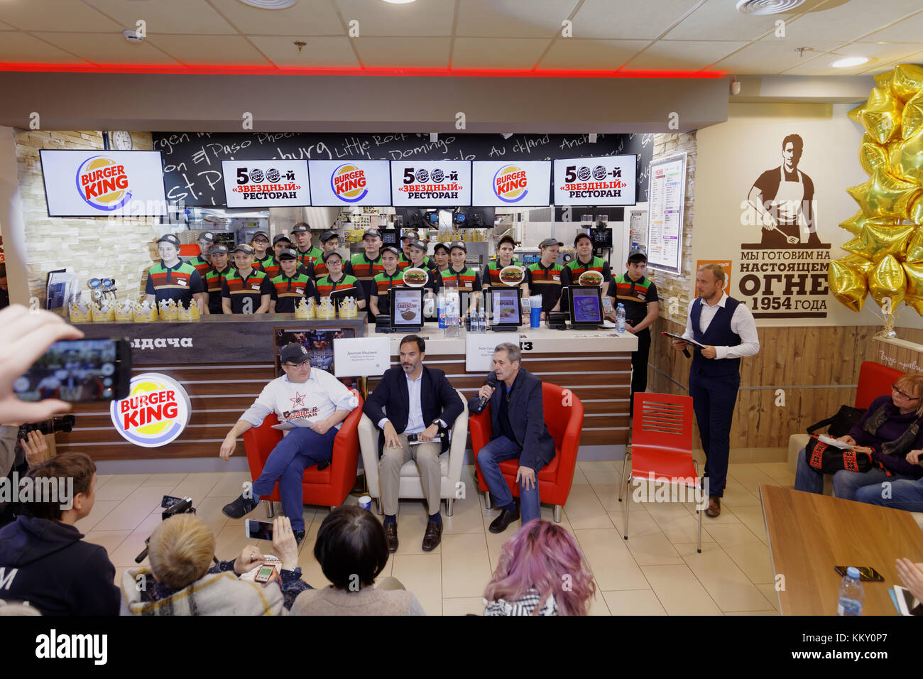 Press conference of Jose Cil (center), President of Burger King, and ...