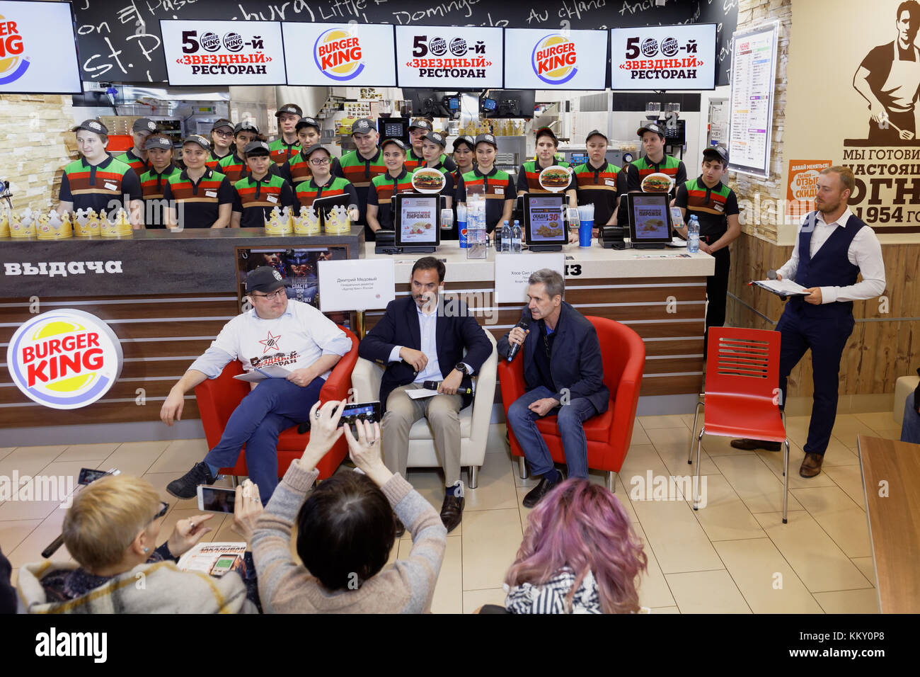 Press conference of Jose Cil (center), President of Burger King, and ...