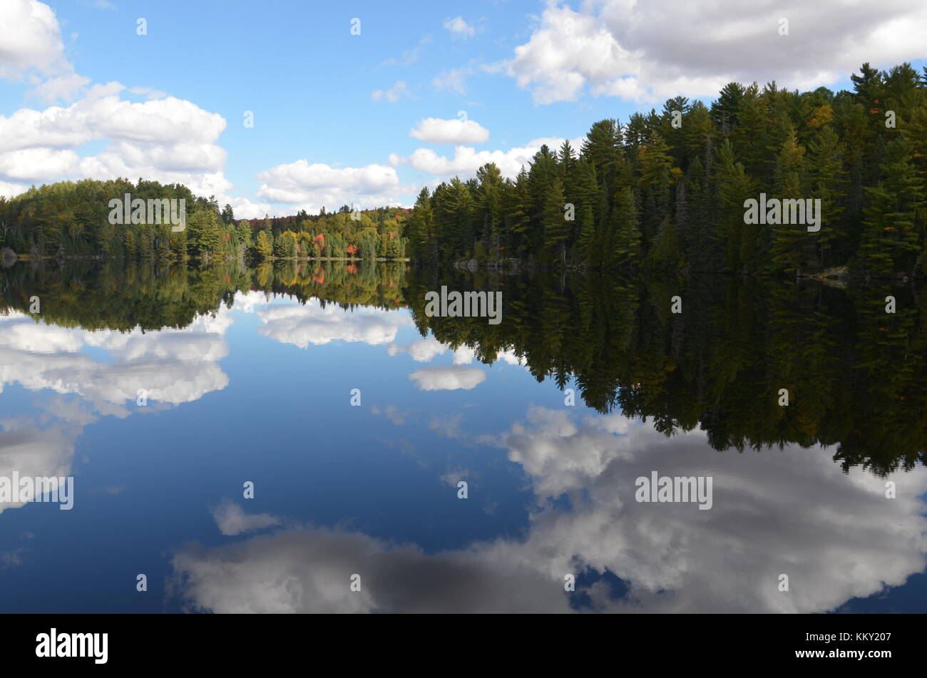 Dramatic cloud reflecttion on water Stock Photo - Alamy