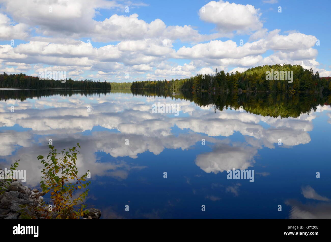 Dramatic cloud reflecttion on water Stock Photo - Alamy