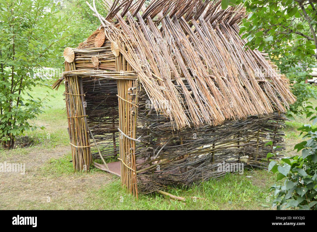Authentic hut from the branches of the forest, summer Sunny day Stock ...