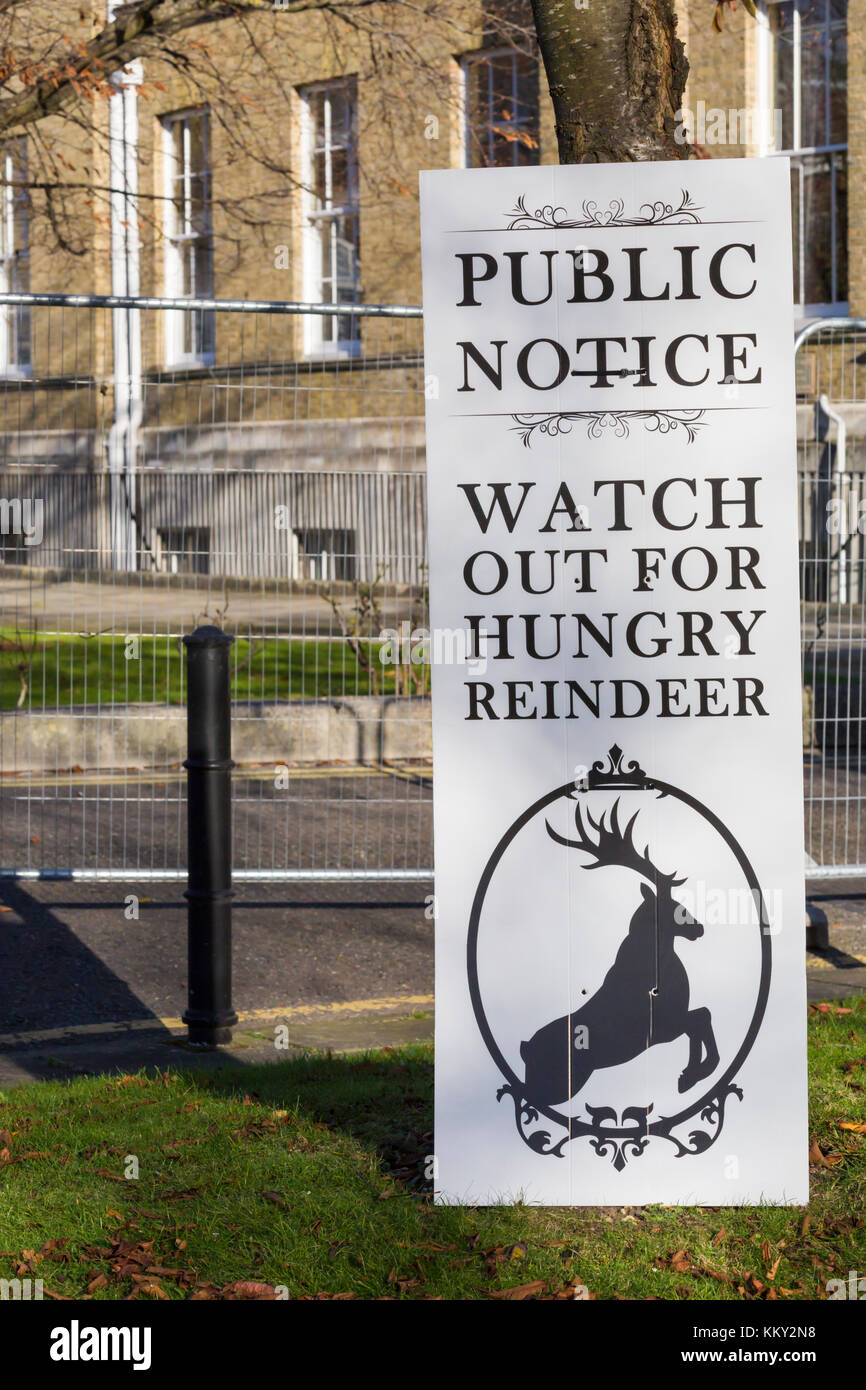 Public notice watch out for hungry reindeer sign hi-res stock ...