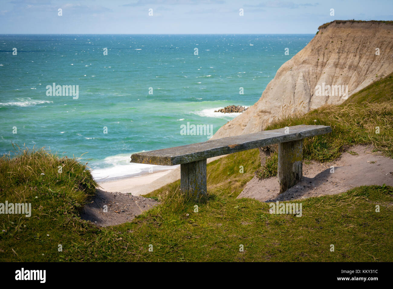 Lonely bench on the shore Stock Photo - Alamy
