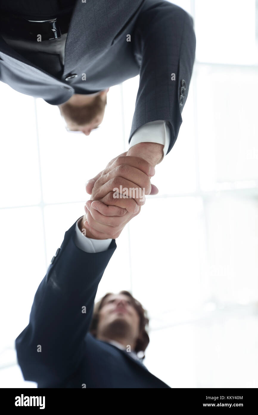 Two business people are holding hands to business cooperation Stock ...