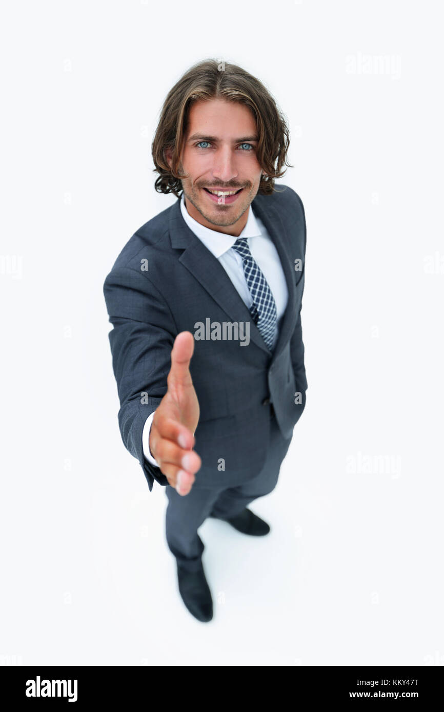 Business man extending hand to shake - focus om hand Stock Photo - Alamy
