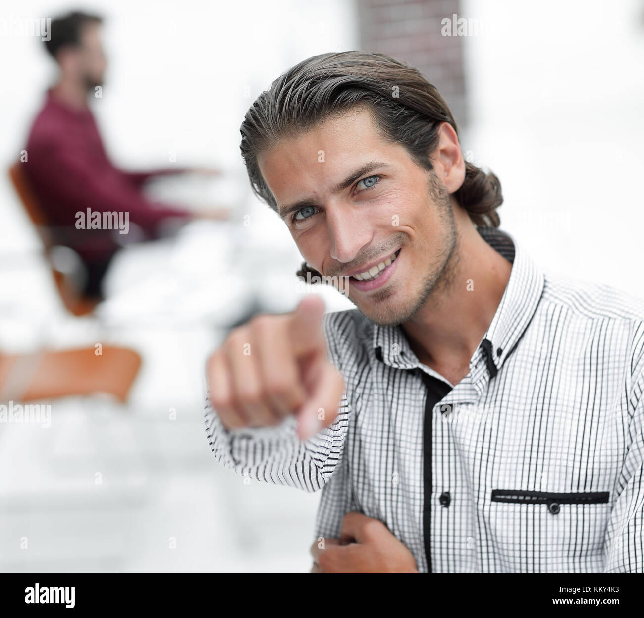 successful employee pointing forward Stock Photo - Alamy