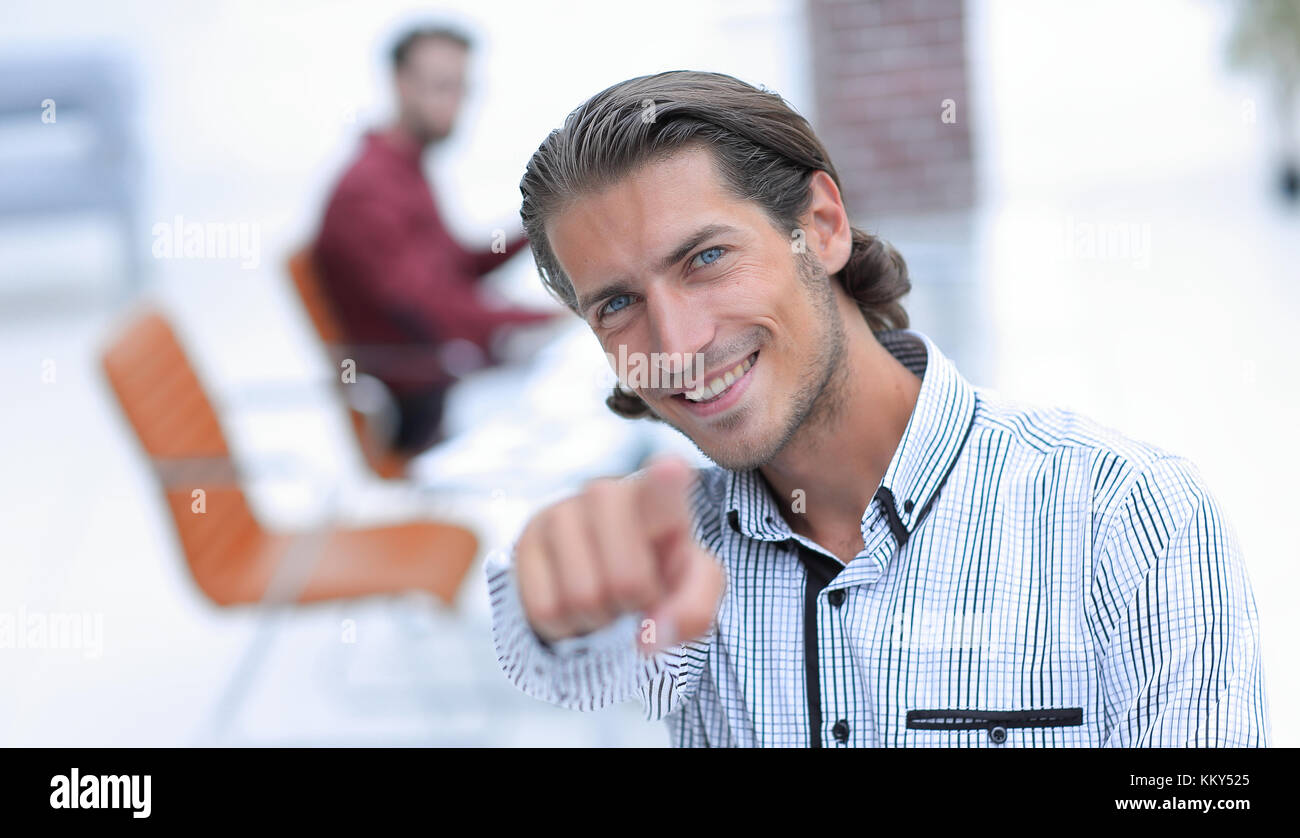 successful man pointing his finger forward Stock Photo - Alamy