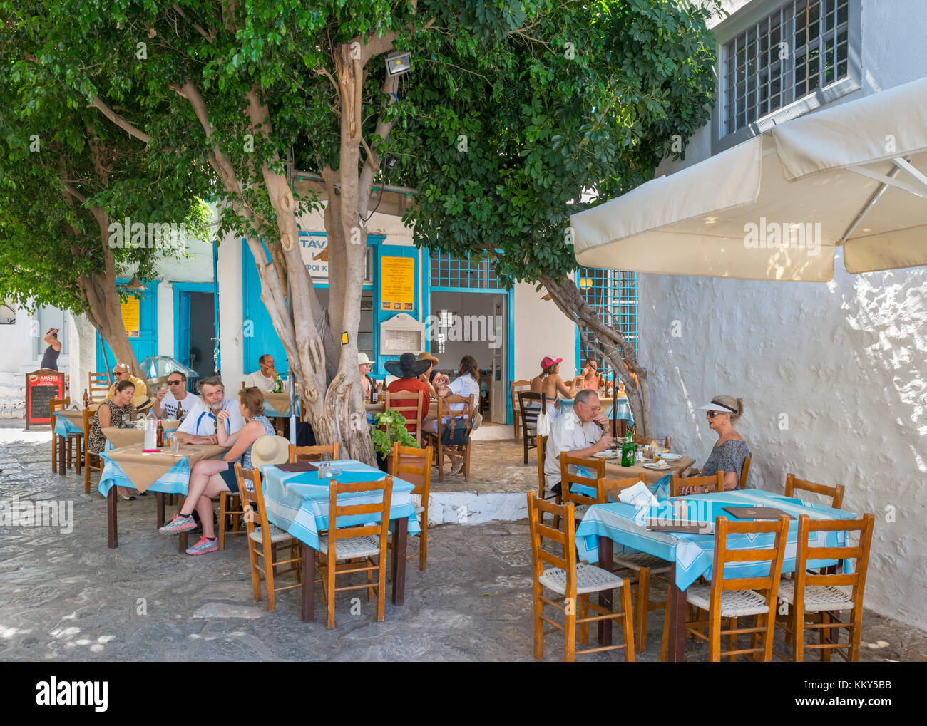 Traditional Greek taverna in the village centre, Hydra town, Hydra ...