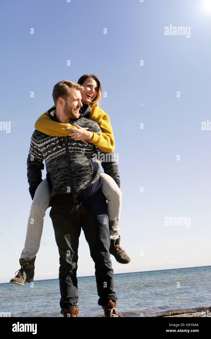 Couple piggyback carry hi-res stock photography and images - Alamy