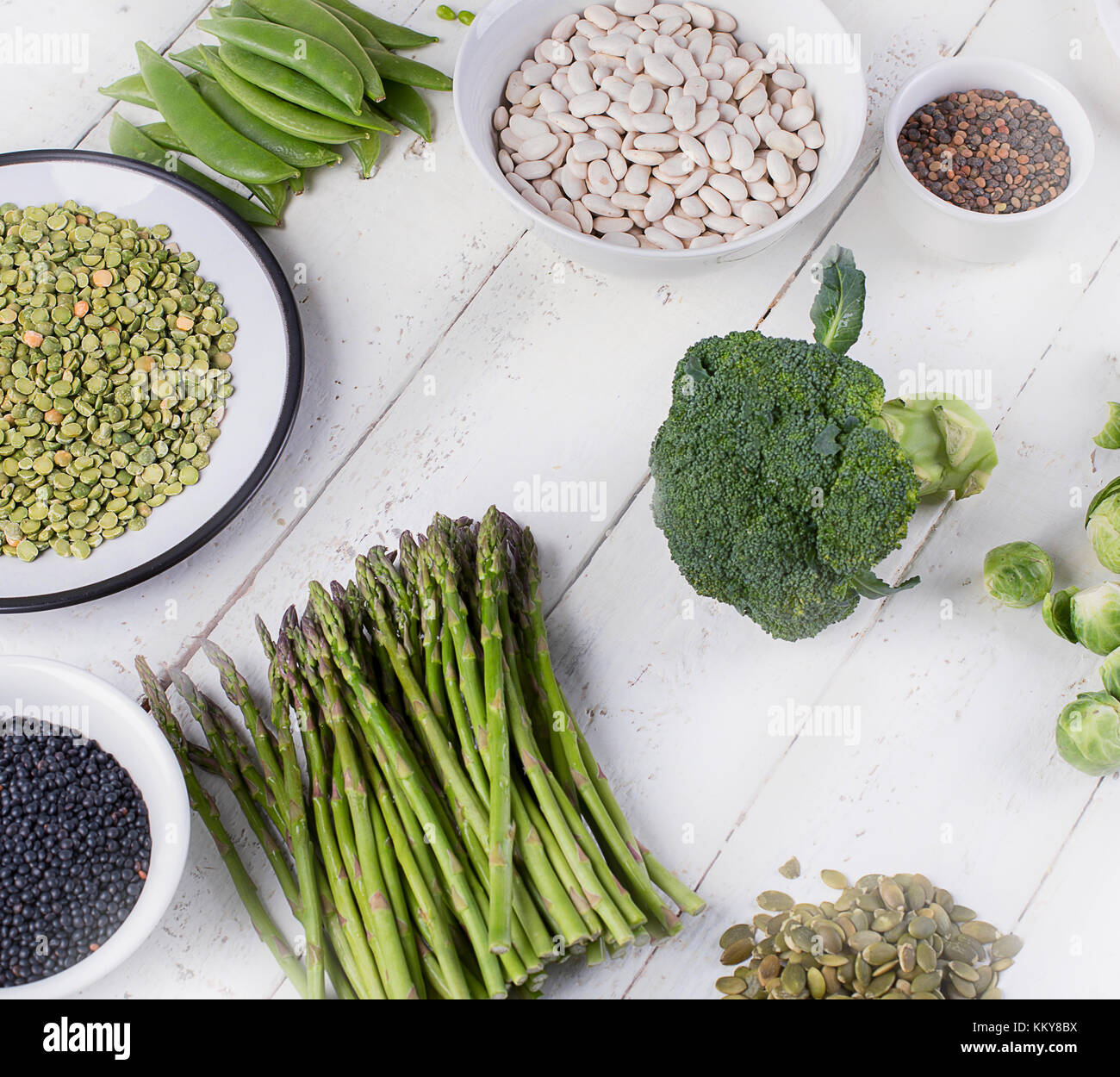 Vegan protein sources on a white wooden background. Top view Stock ...