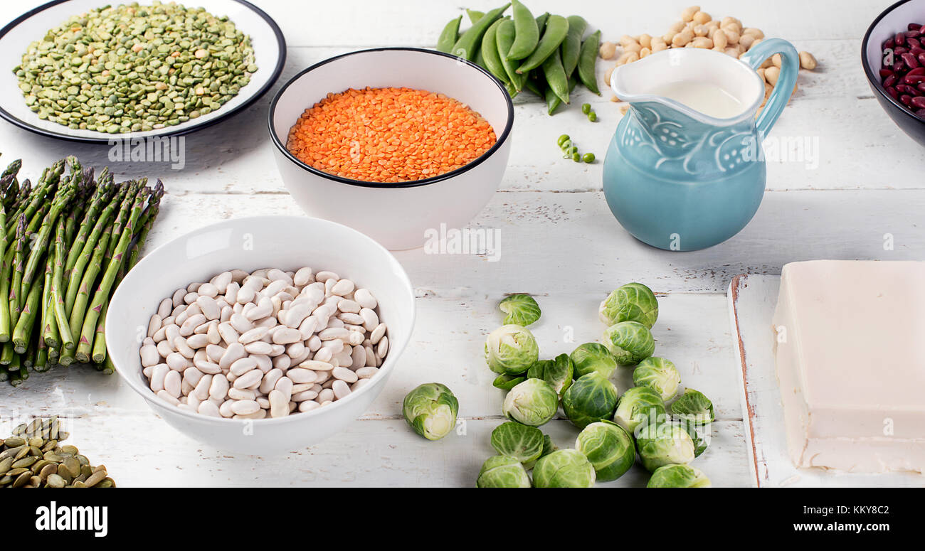 Vegan protein sources on a white wooden background. Top view Stock ...
