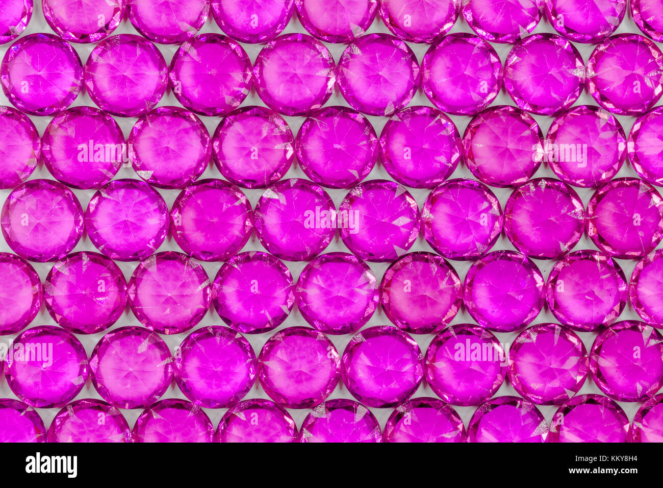 close up pink diamond in pattern. diamond put in horizion row and ...