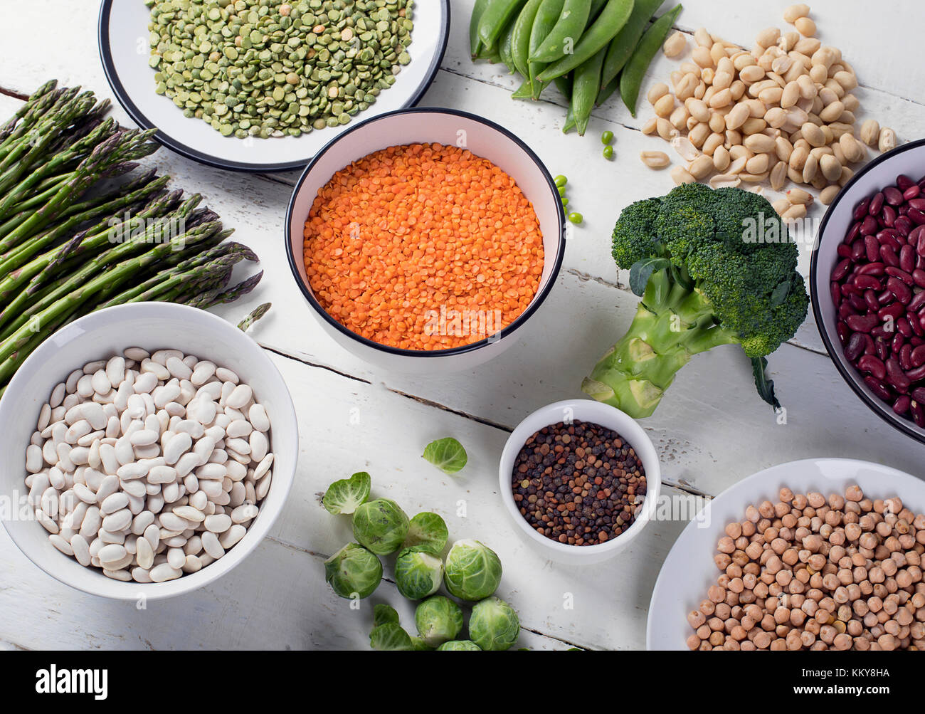 Vegan protein sources on a white wooden background. Top view Stock ...