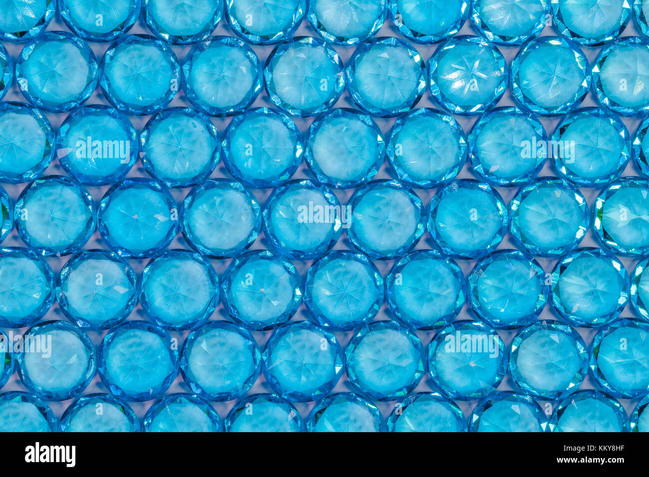 close up light blue diamond in pattern. diamond put in horizion row and ...