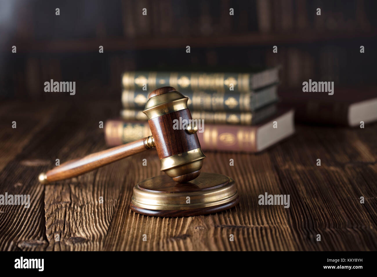 Beautiful antique gavel made of wood and brass. Law symbols composition ...