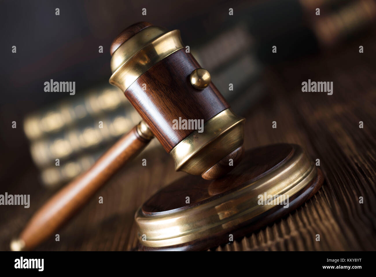 Beautiful antique gavel made of wood and brass. Law symbols composition ...