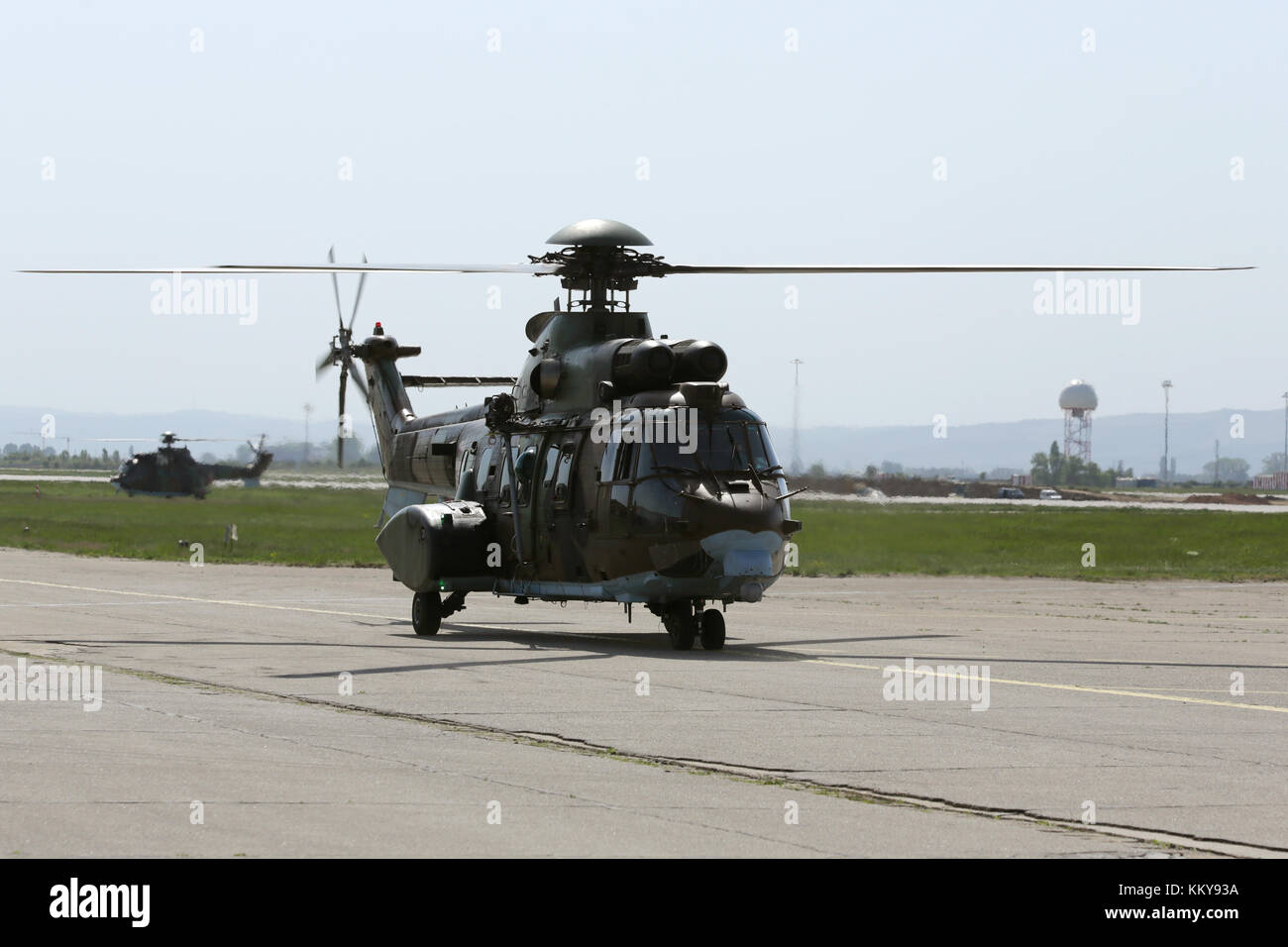 Military helicopters at the runway of the airport Stock Photo - Alamy
