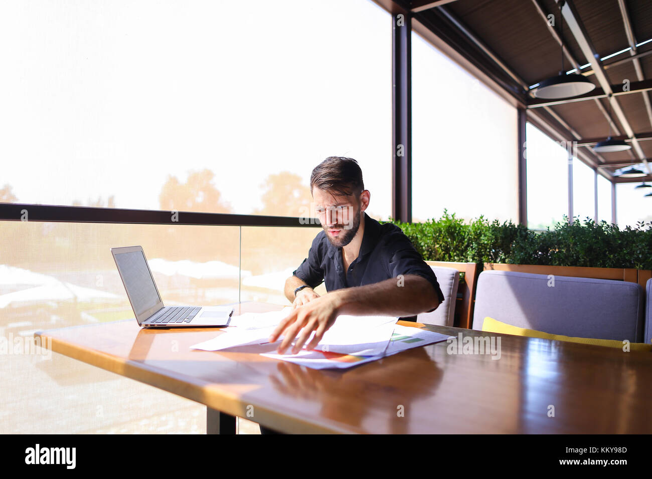 Office worker sorting papers hi-res stock photography and images - Alamy