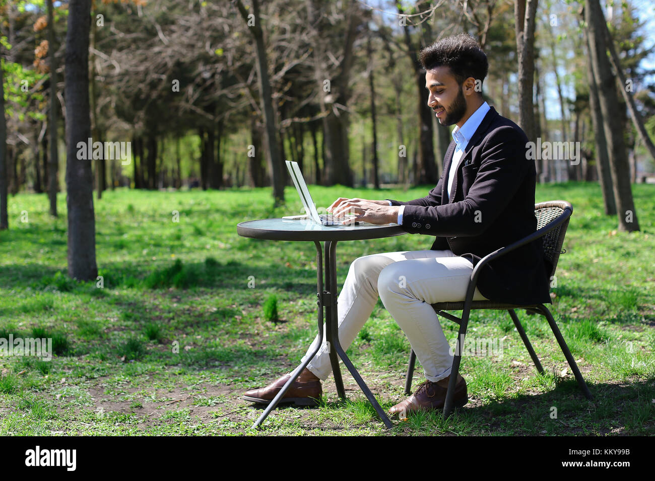 Person using laptop and clicking keyboard, putting hands up, close ...