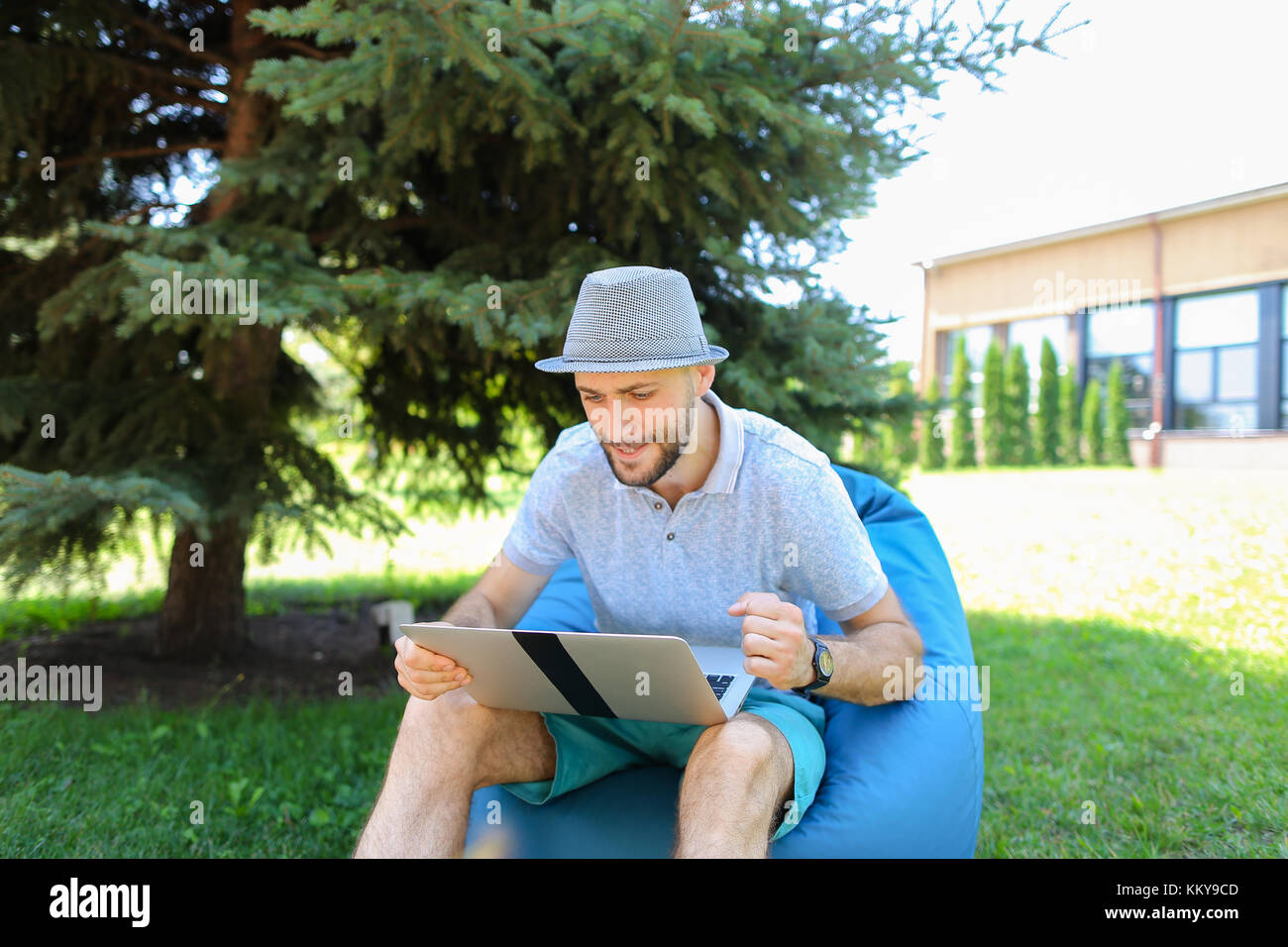 Gladden man watching live stream game and rejoicing favorite sport ...