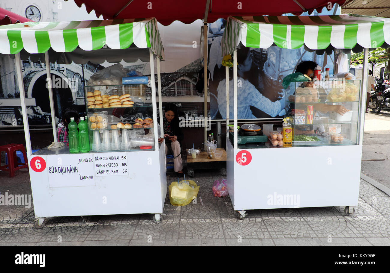 HO CHI MINH CITY, VIET NAM- DEC 1, 2017: Group of food cart on pavement ...