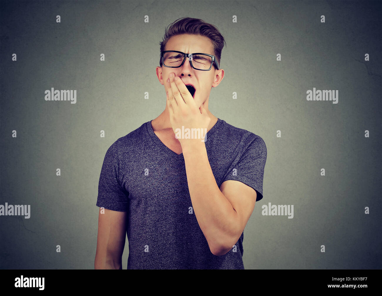 Man with hand over his mouth hi-res stock photography and images - Alamy