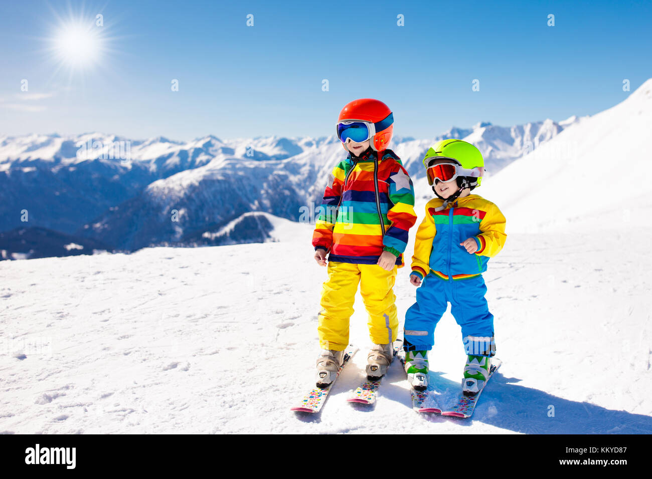 Child skiing in the mountains. Kid in ski school. Winter sport for kids ...